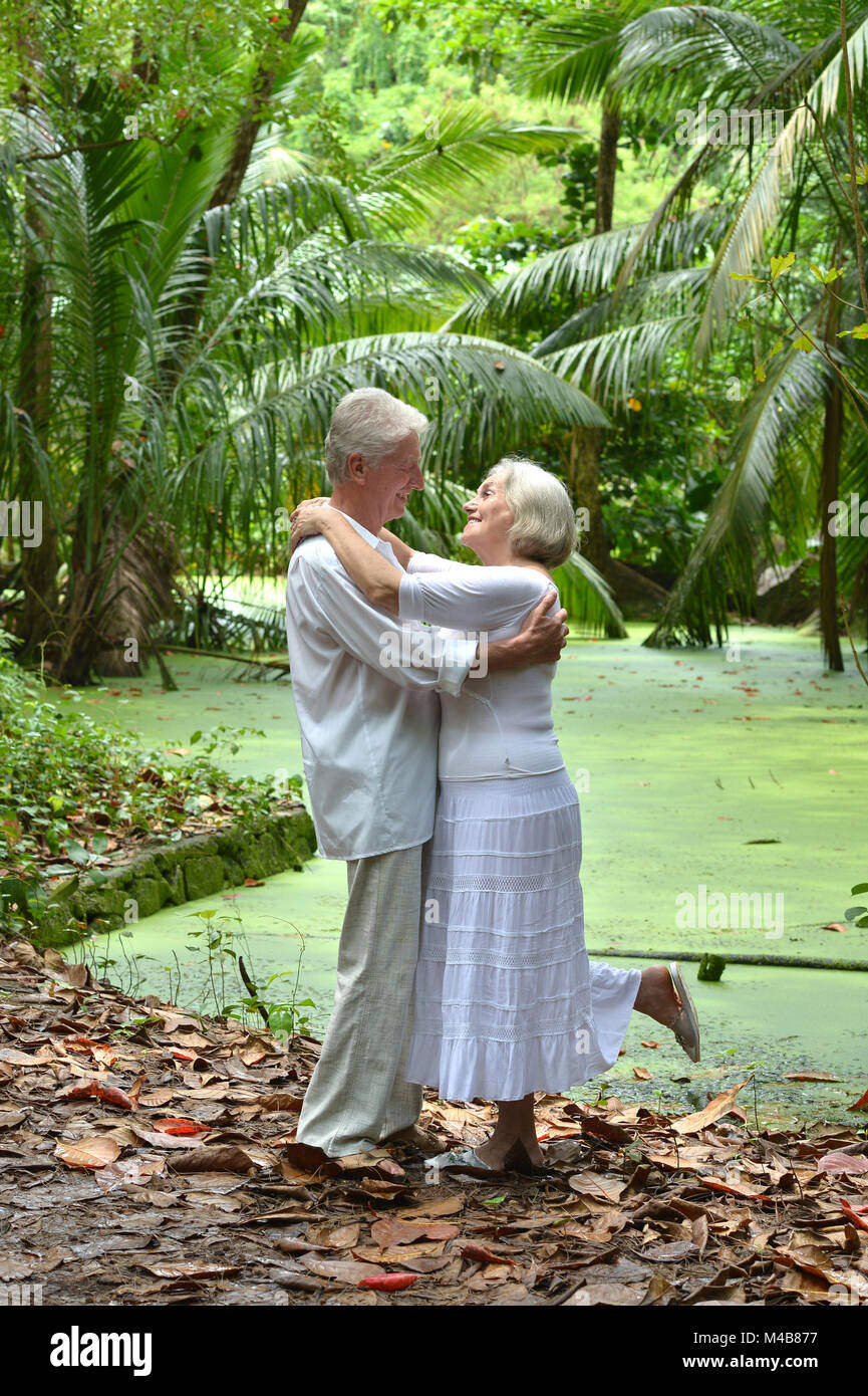 elderly couple rest at tropical beach Stock Photo - Alamy