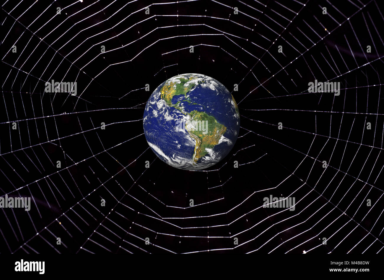Earth in web Stock Photo - Alamy