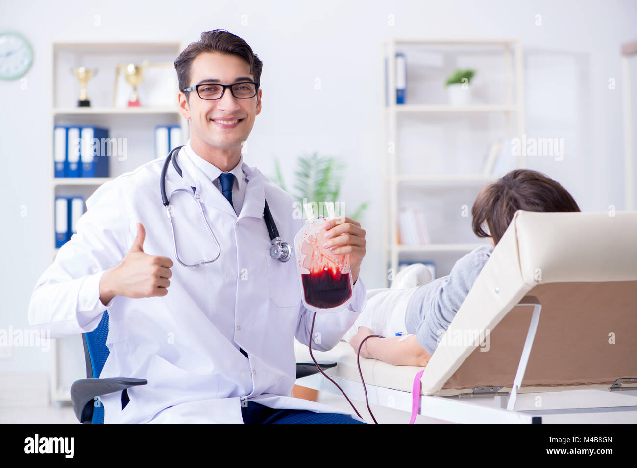 Patient getting blood transfusion in hospital clinic Stock Photo - Alamy