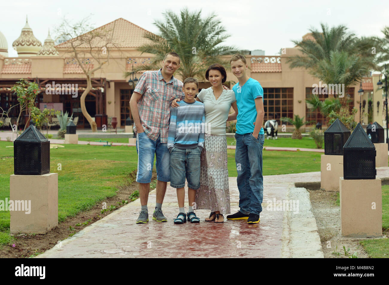 happy family at resort Stock Photo - Alamy
