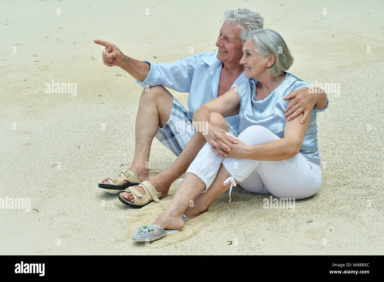 elderly couple rest at tropical resort Stock Photo - Alamy