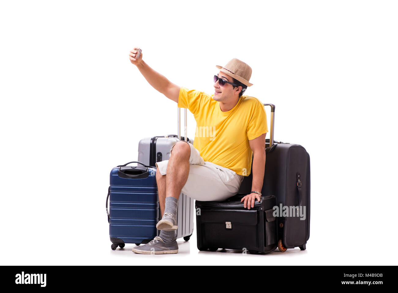 Happy young man going on summer vacation isolated on white Stock Photo ...