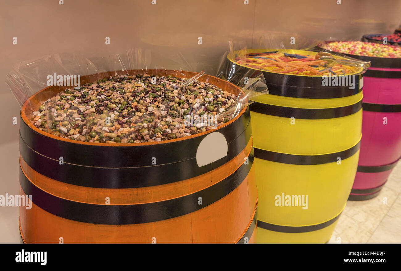 Stone shaped candies in wooden barrel Stock Photo - Alamy