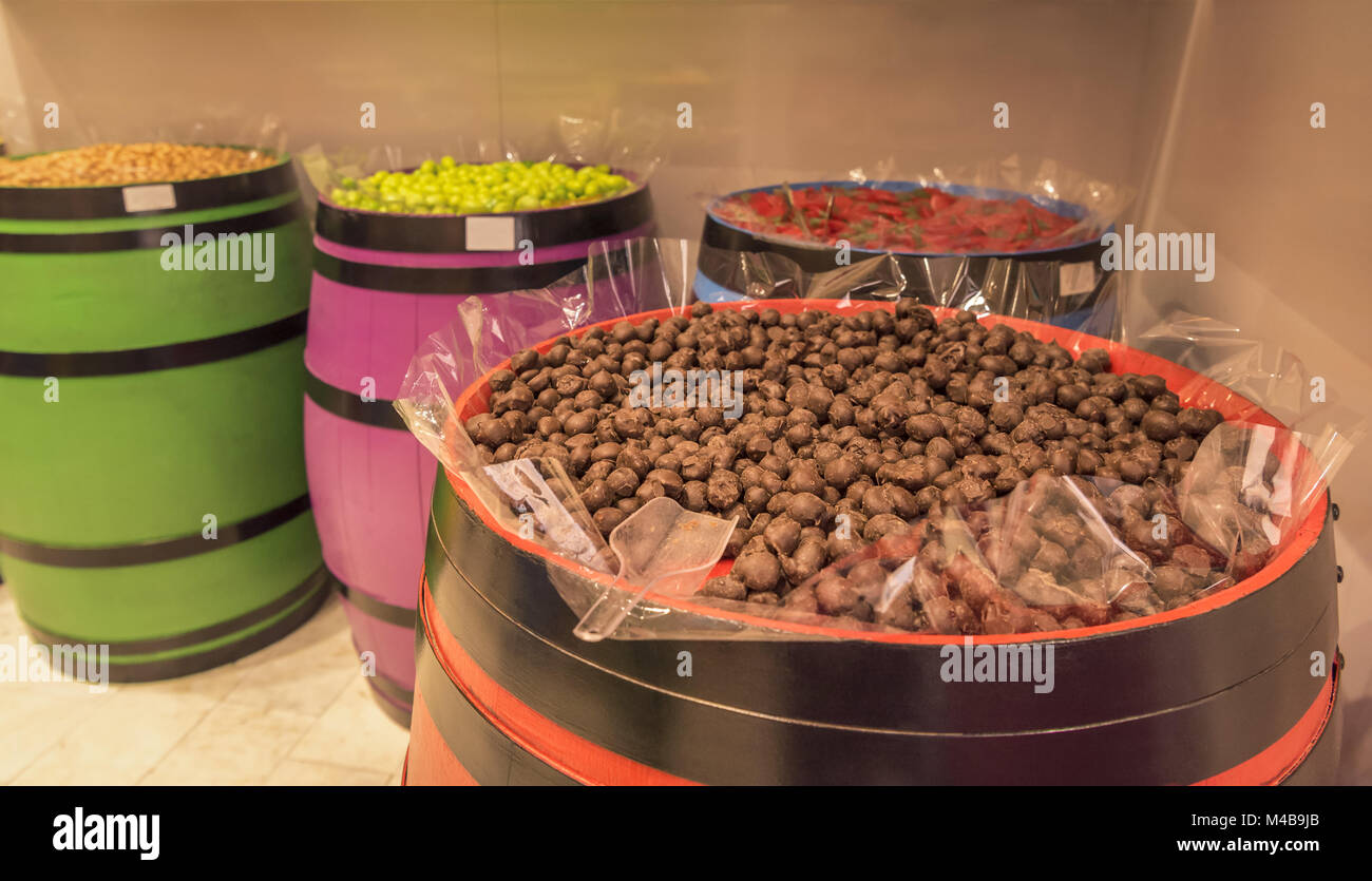 Chocolate candies in wooden barrel Stock Photo - Alamy