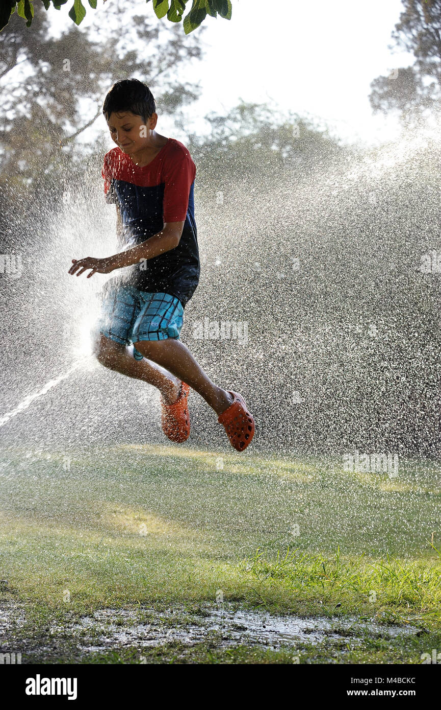 Play with water jets Stock Photo - Alamy