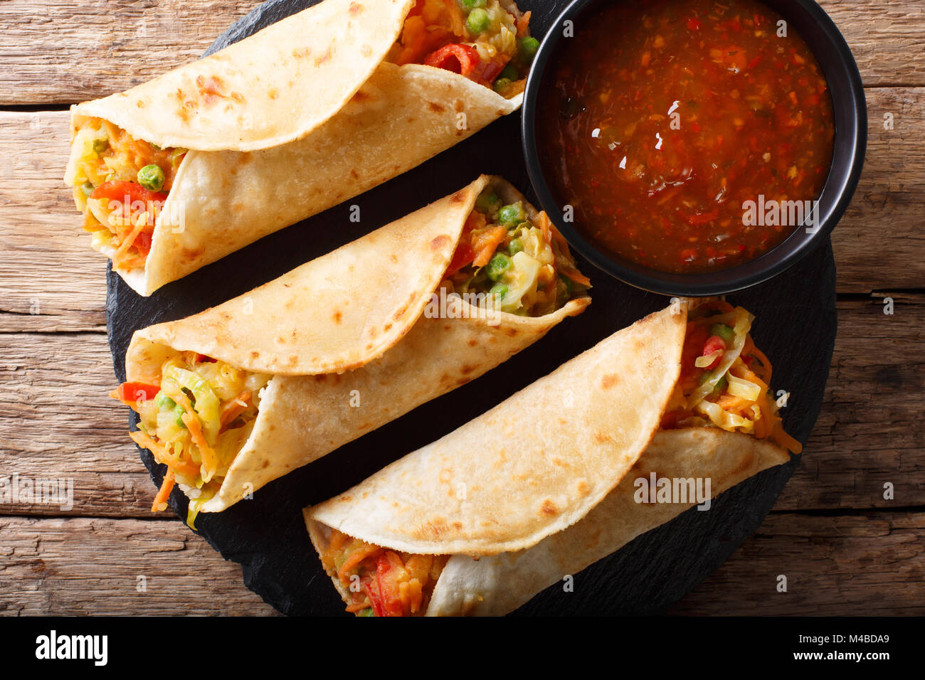 Indian street vegetarian food: Franky Roti roll stuffed with vegetables ...