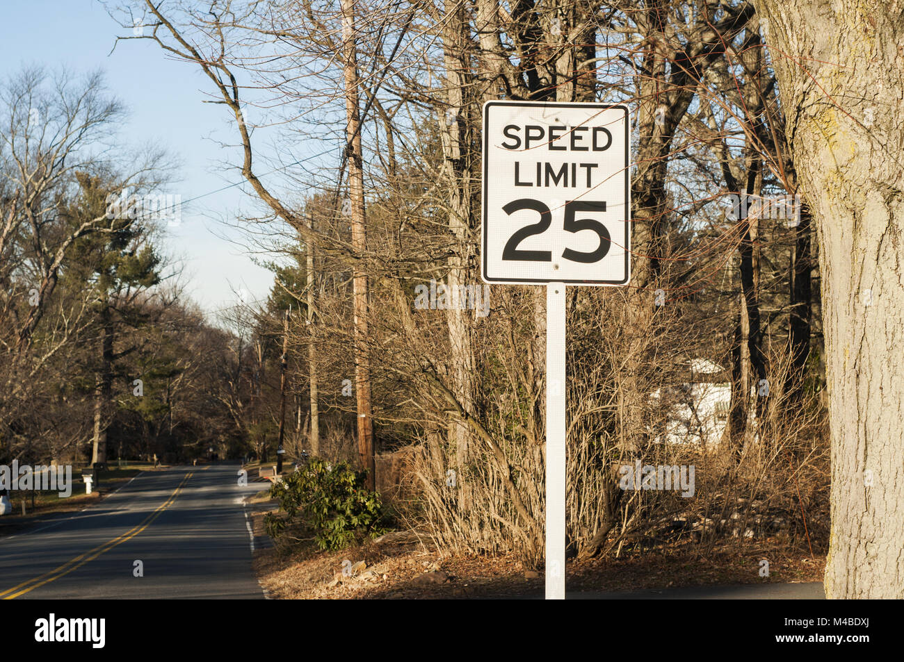 Road sign about speed limit Stock Photo - Alamy