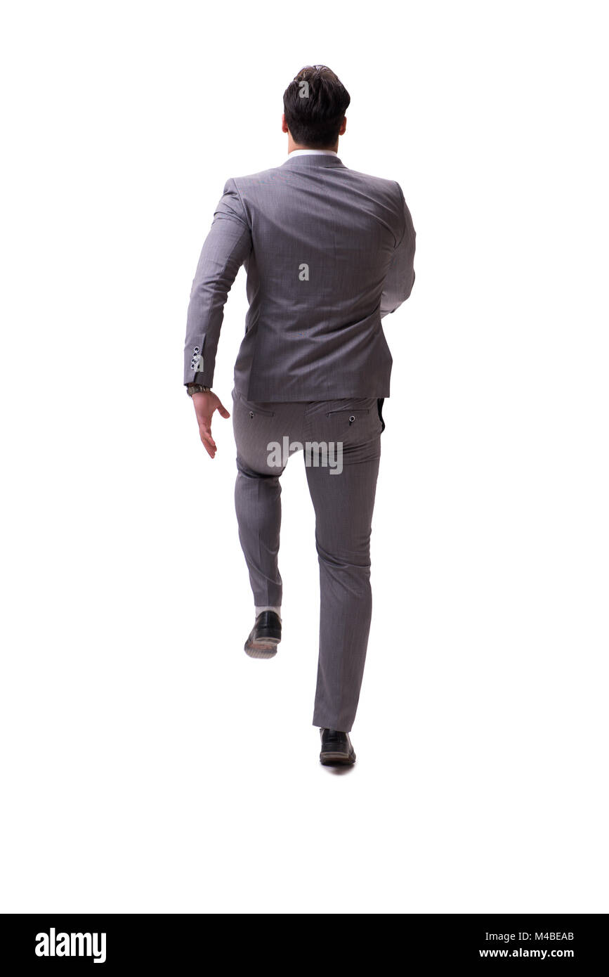 Businessman walking away isolated on white background Stock Photo - Alamy