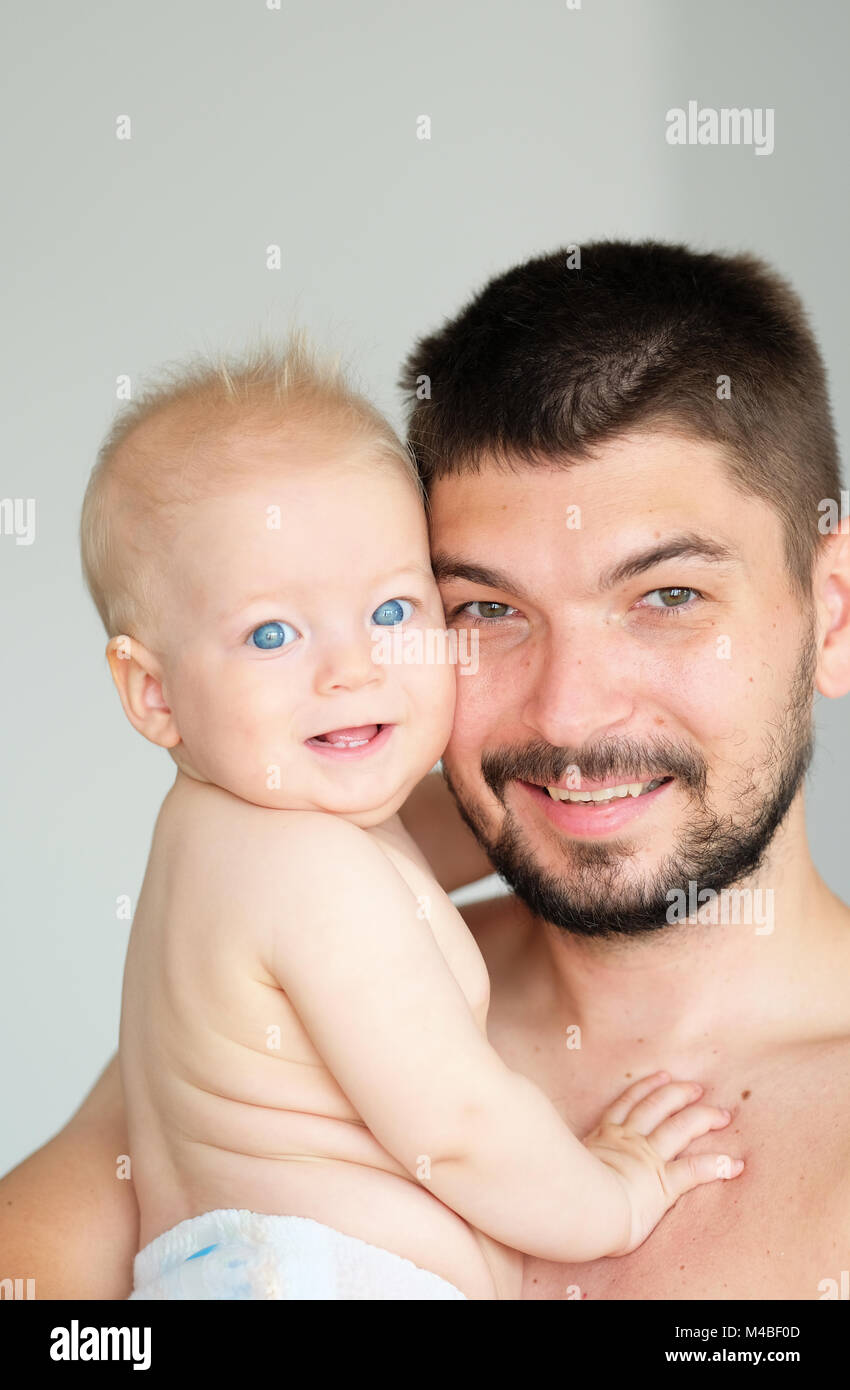 Baby boy with father Stock Photo - Alamy