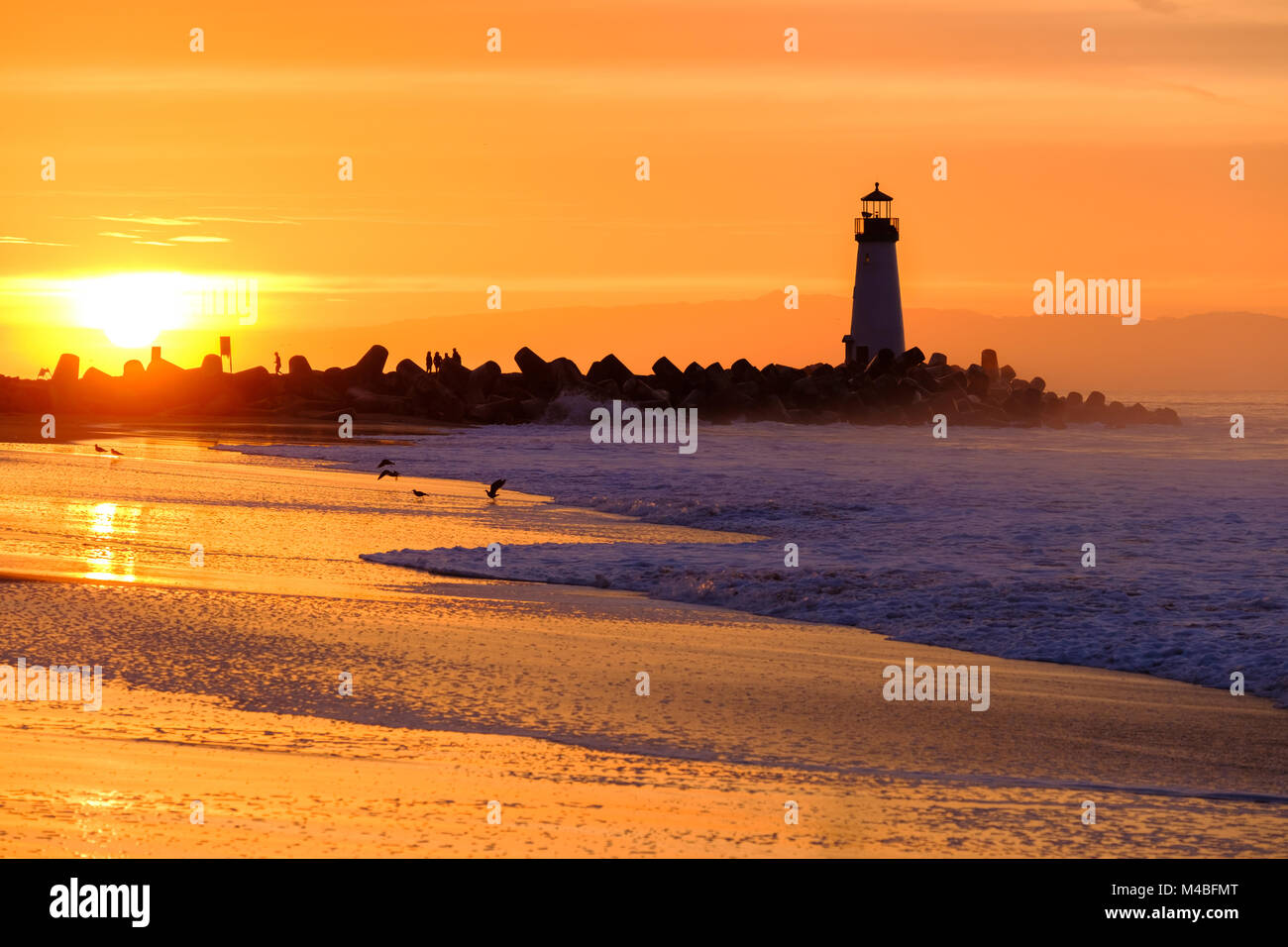 Santa Cruz Breakwater Light (Walton Lighthouse) at sunrise Stock Photo ...