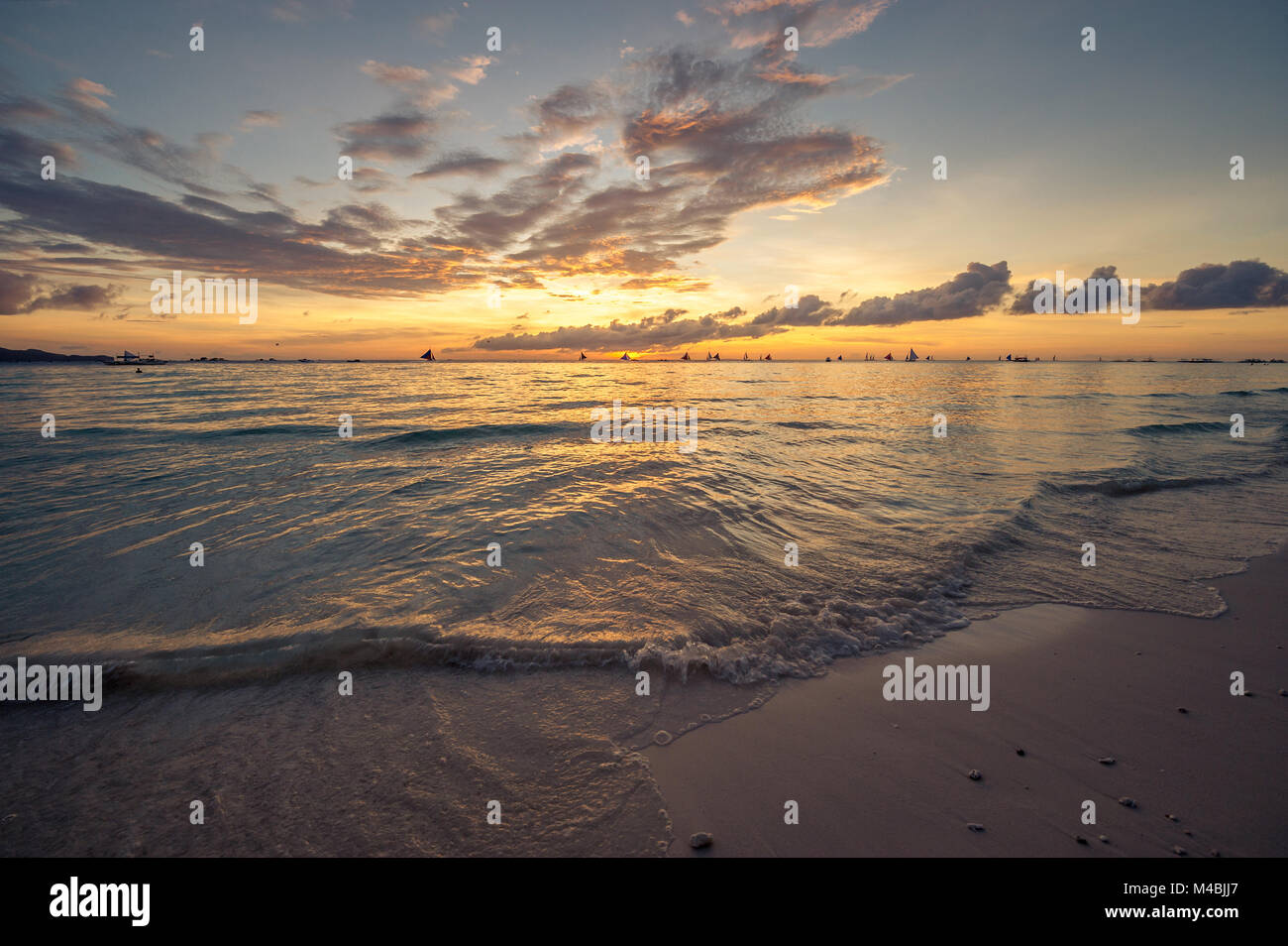 Beautiful sunset at Boracay beach, Philippines Stock Photo - Alamy