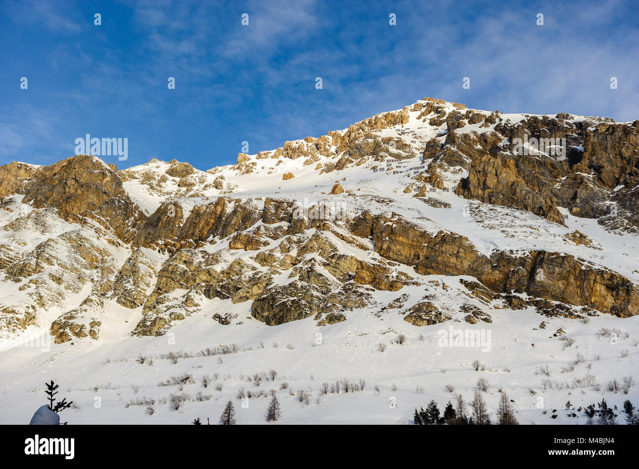 Alpine winter mountain landscape. French Alps with snow Stock Photo - Alamy