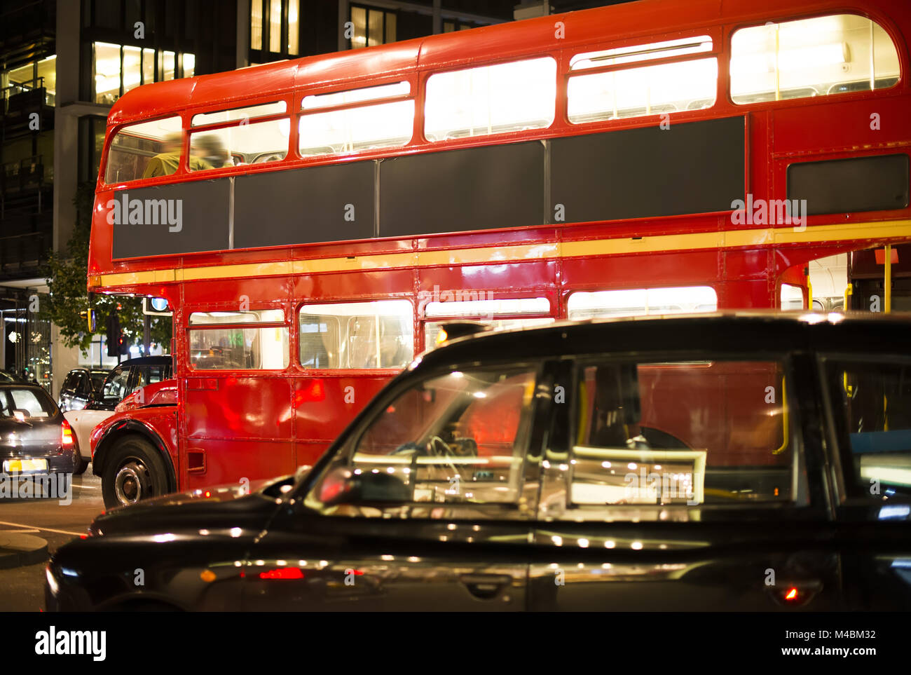 Red vintage bus and classic style taxi in London Stock Photo - Alamy