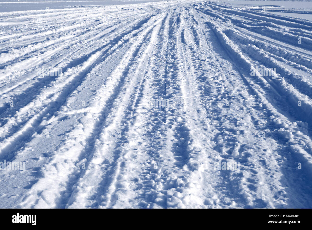 Car tyre tracks on snow hi-res stock photography and images - Alamy