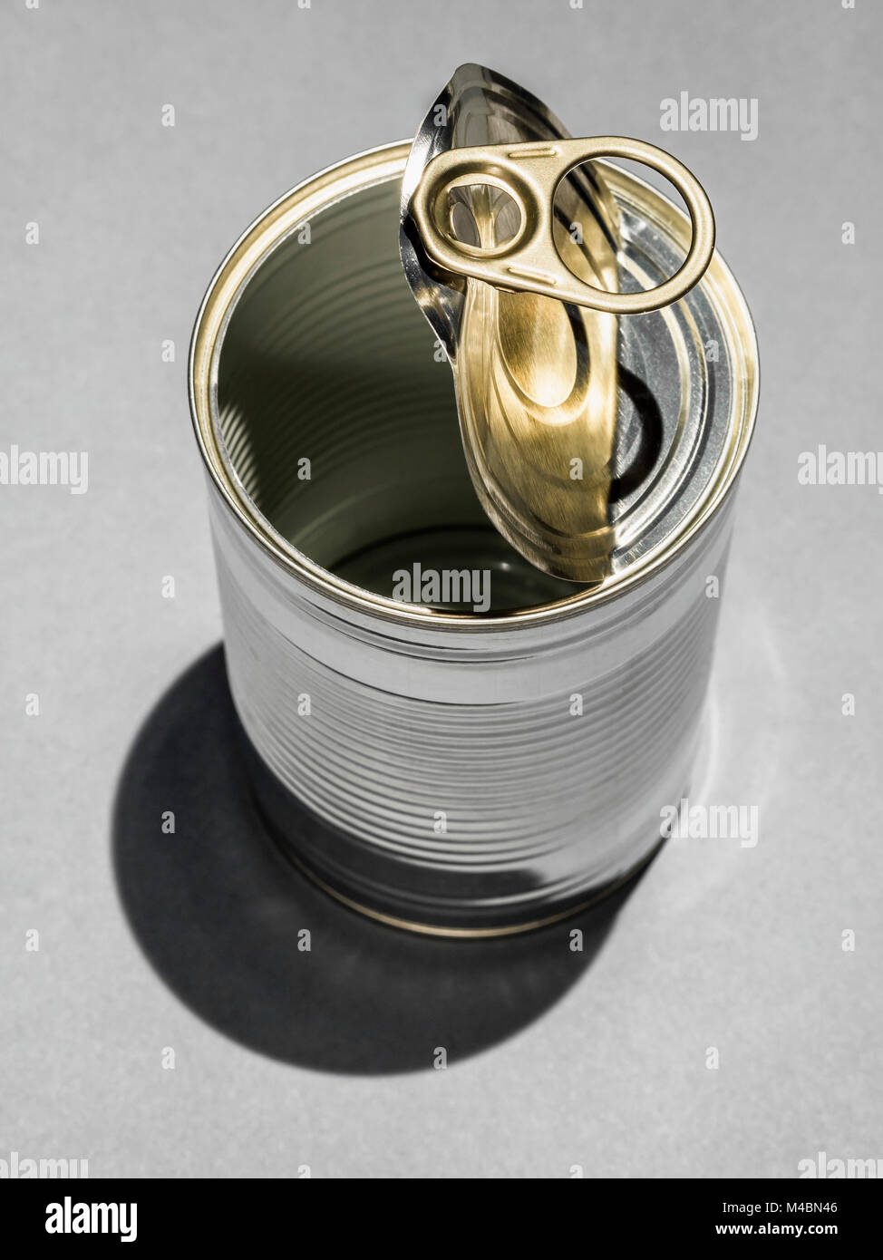 Empty open tin can,studio shot,cutout Stock Photo - Alamy