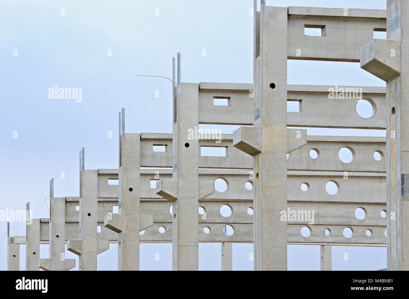 Pillars and ceiling girder a new industrial hall Stock Photo - Alamy