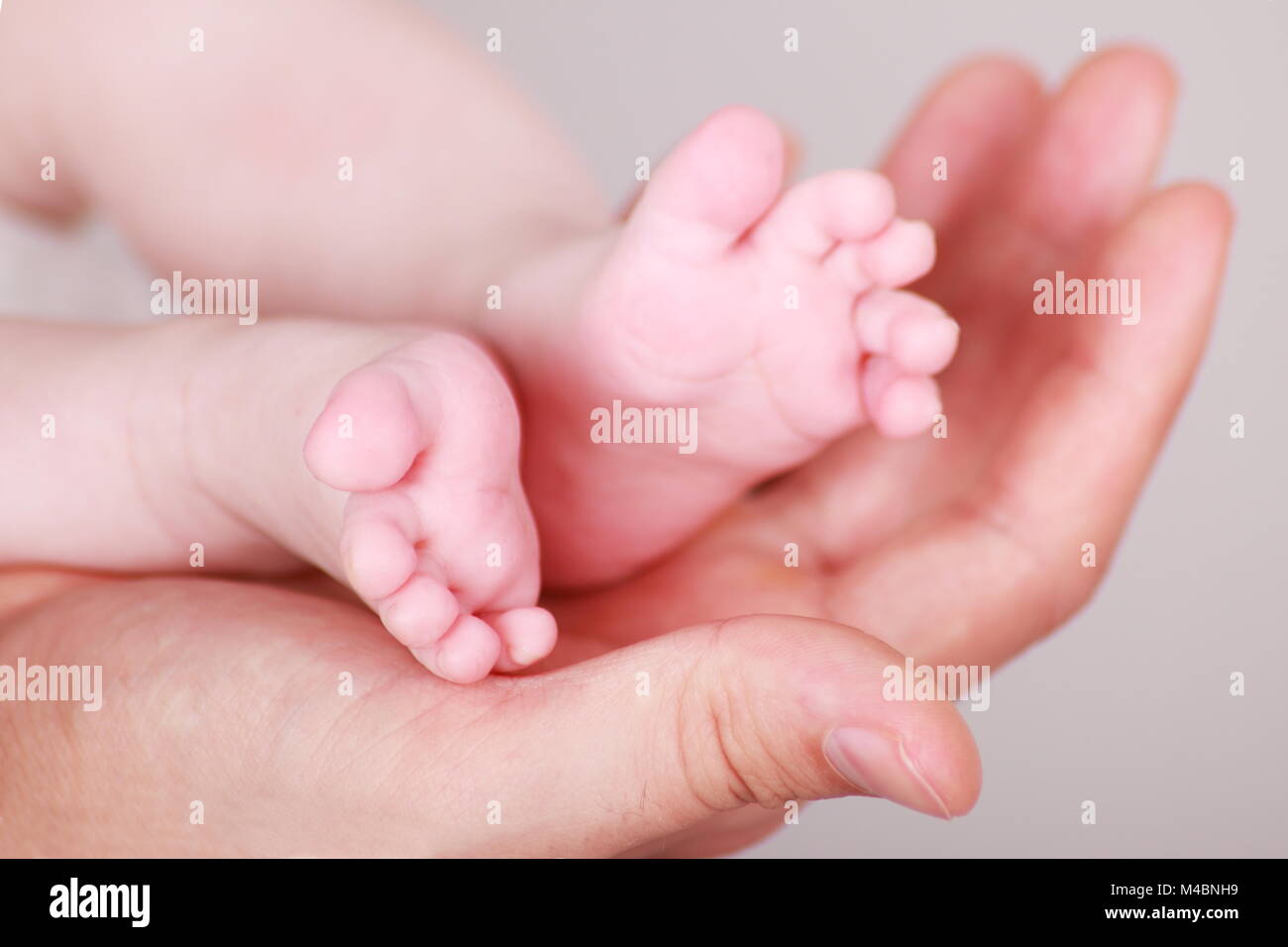 Hands and feet hi-res stock photography and images - Alamy
