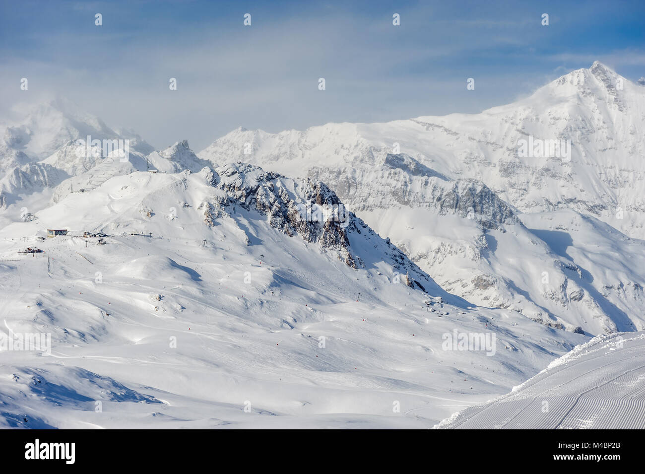 Alpine winter mountain landscape. French Alps with snow Stock Photo - Alamy