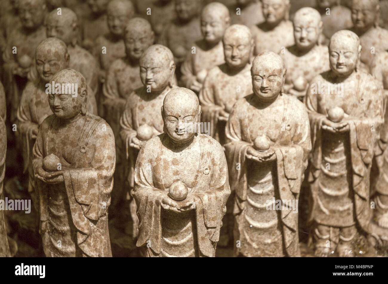 Japanese Jizo sculptures Stock Photo - Alamy