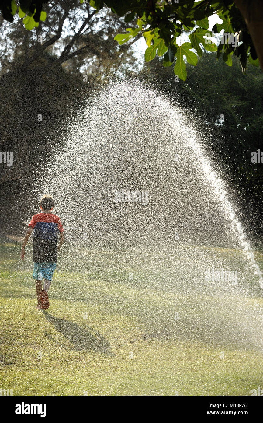 Play with water jets Stock Photo - Alamy