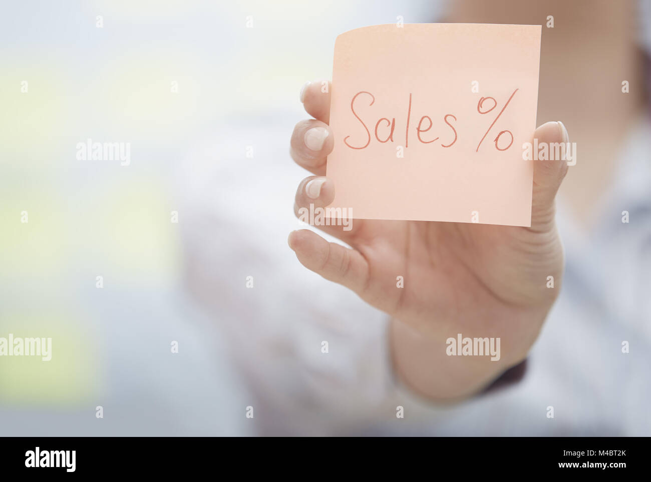 Sales text on adhesive note Stock Photo - Alamy