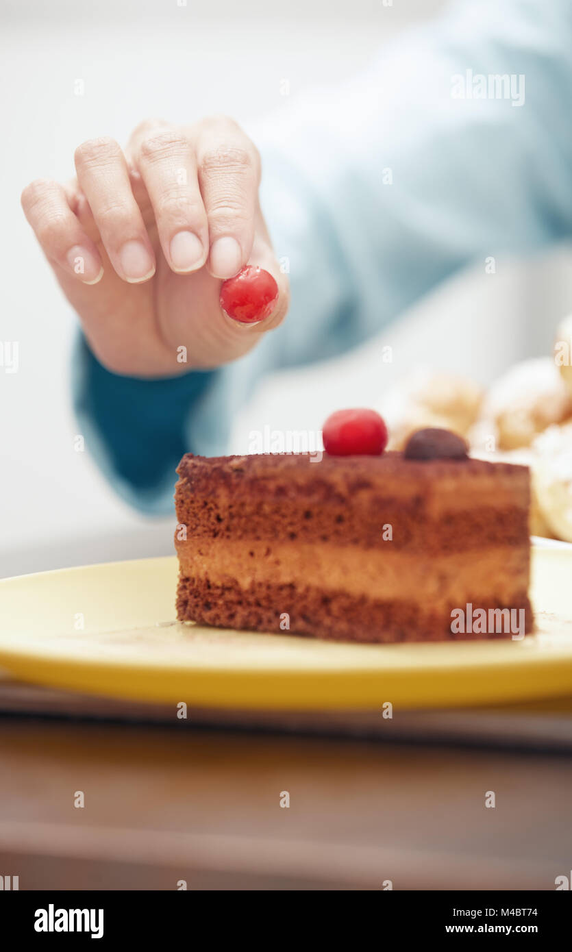 Woman preparing chocolate cake Stock Photo - Alamy