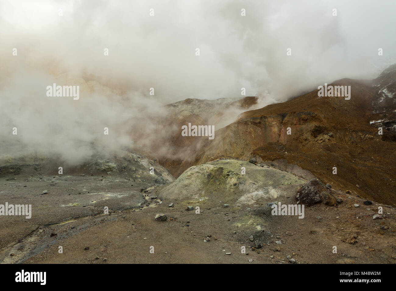 Beautiful slopes Mutnovsky volcano shrouded in clouds Stock Photo - Alamy