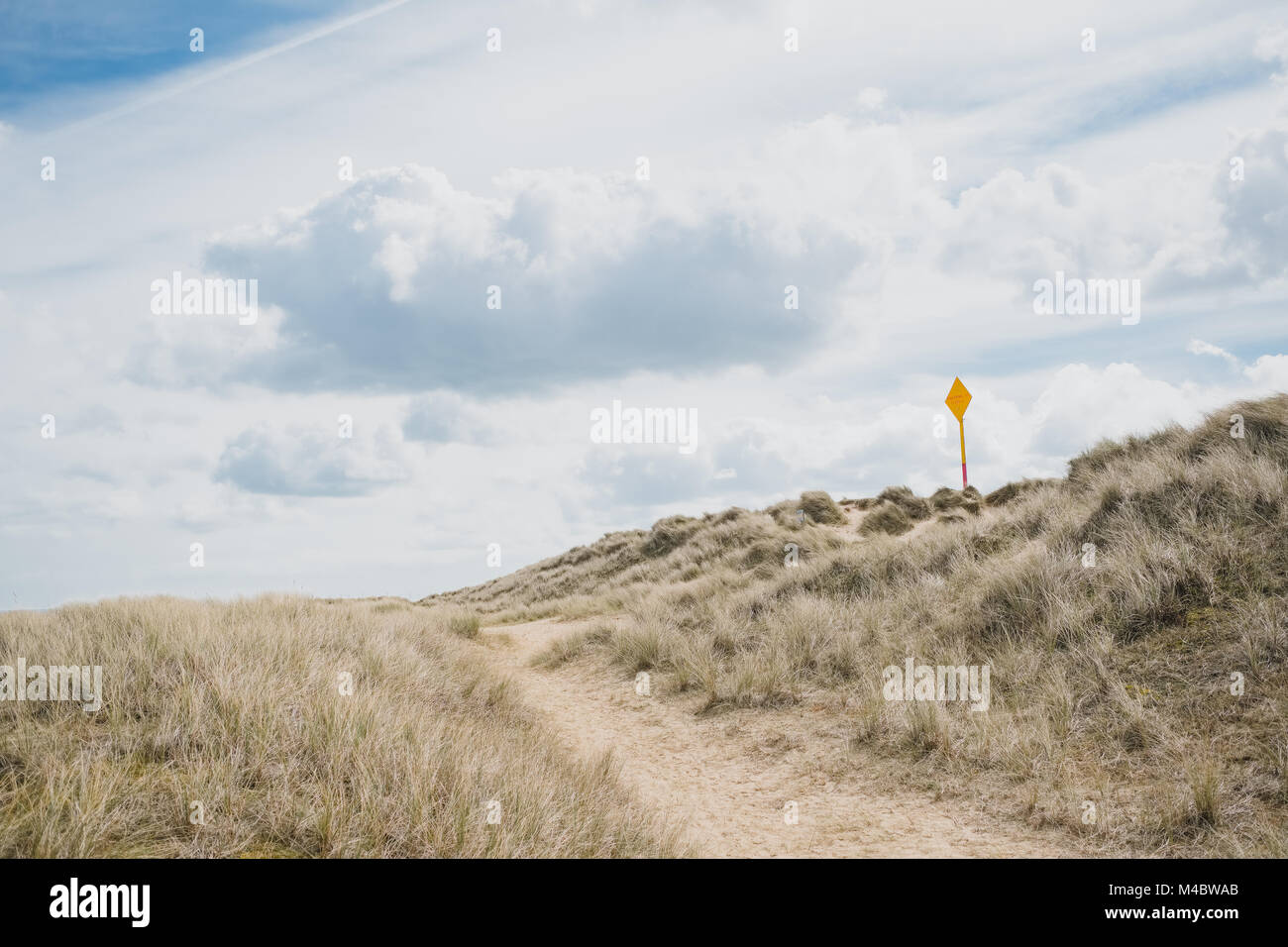 A winding path by the beach, covered in sand and grass, Winterton ...