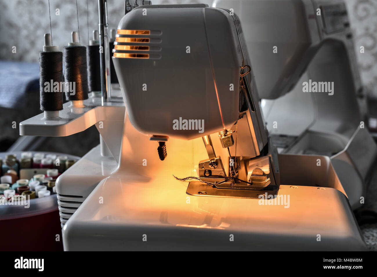 Sewing machine with backlight close-up Stock Photo - Alamy