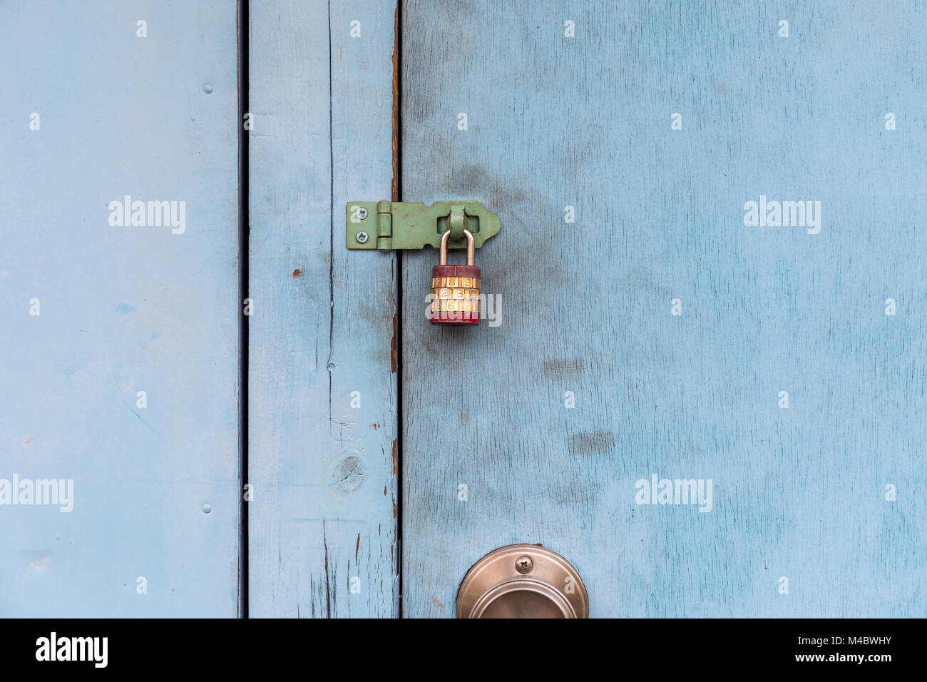Padlock on blue background hi-res stock photography and images - Alamy