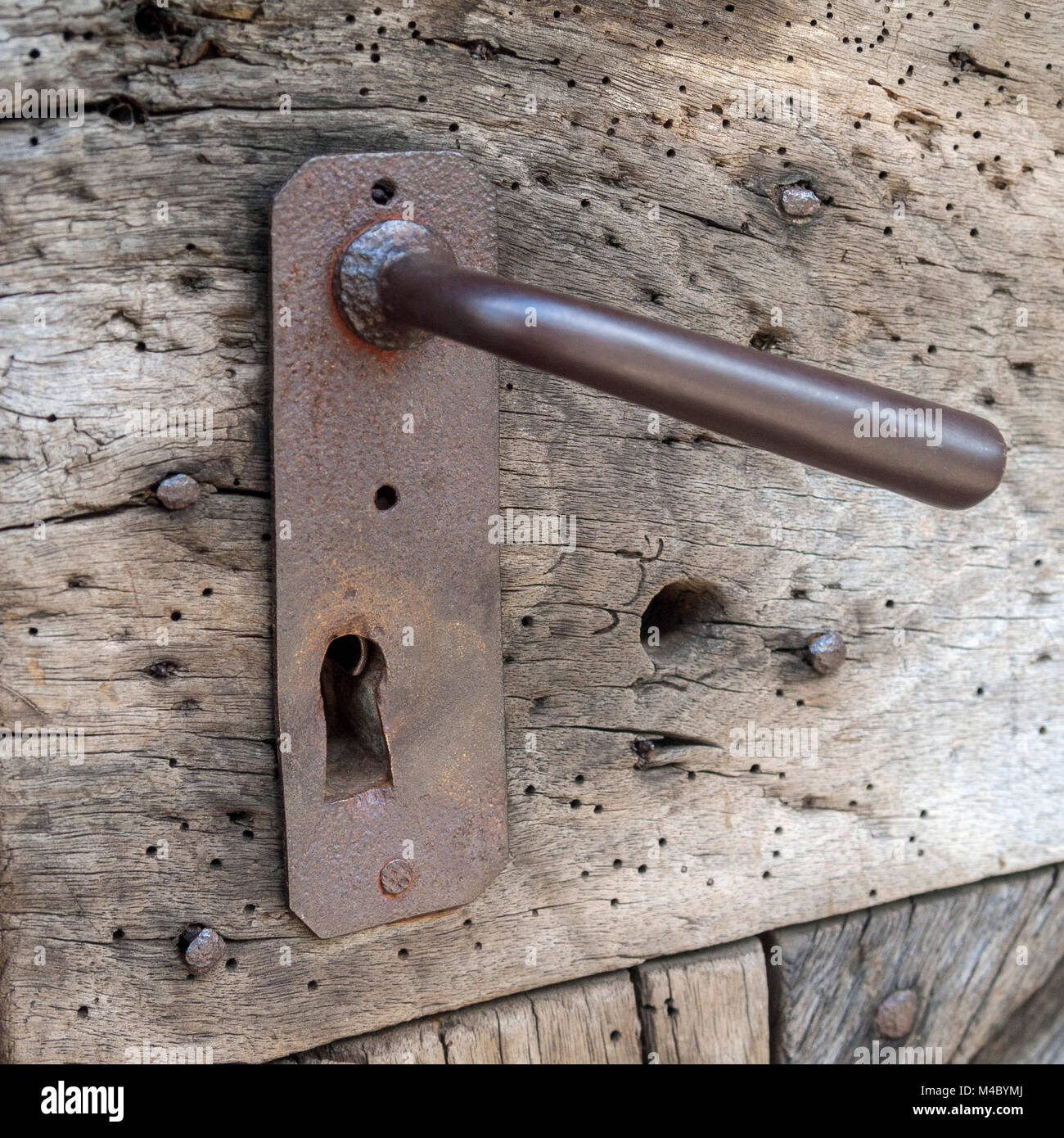 old doorhandle at a historic building Stock Photo - Alamy