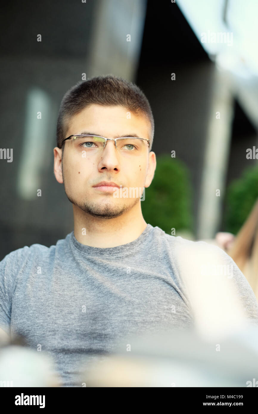 Man in outdoor restaurant Stock Photo - Alamy