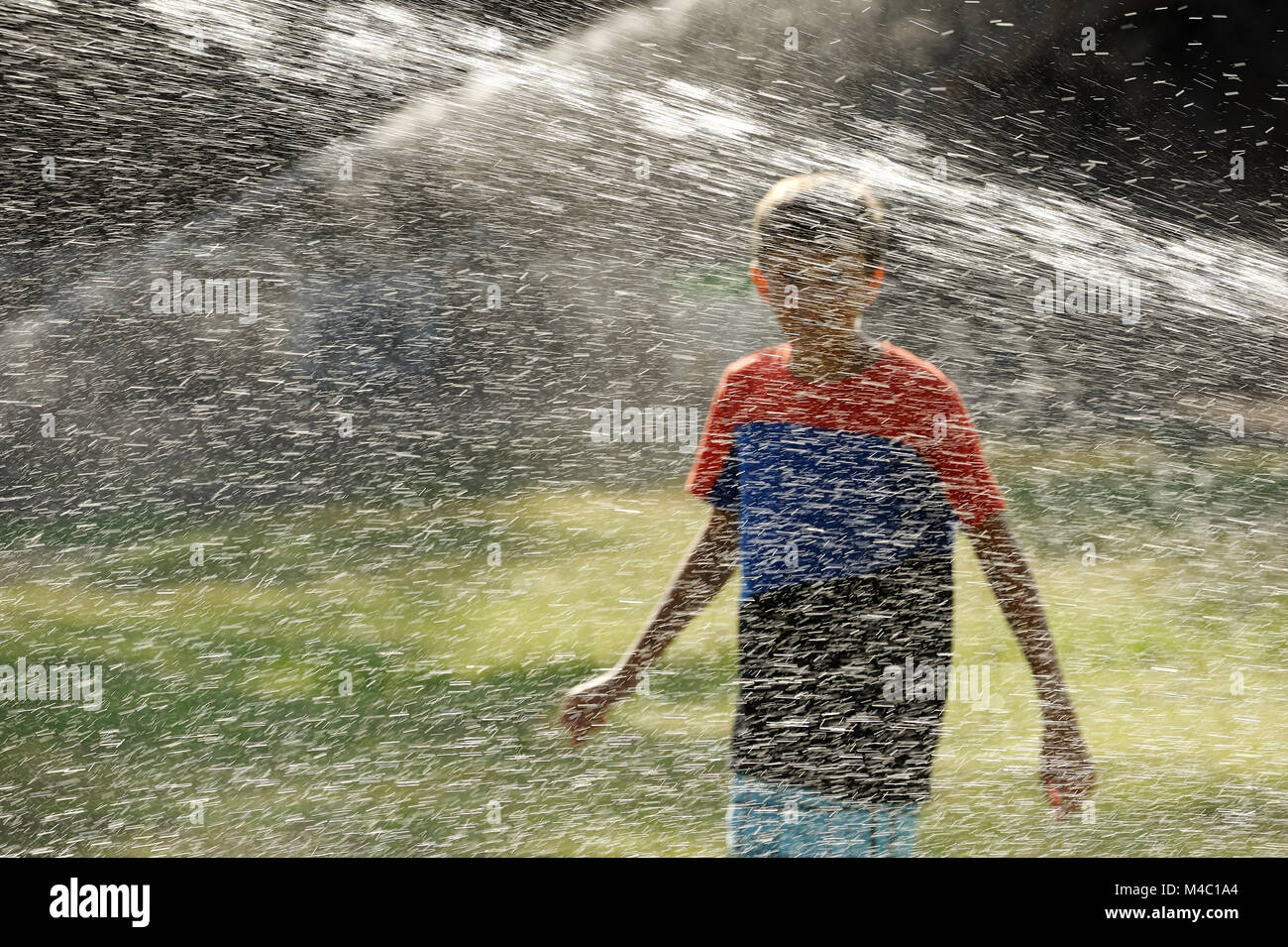 Play with water jets Stock Photo - Alamy
