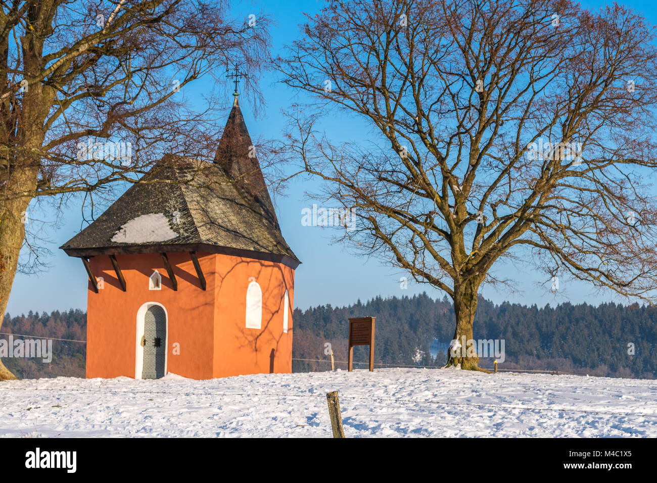Red chapel in snow Stock Photo - Alamy