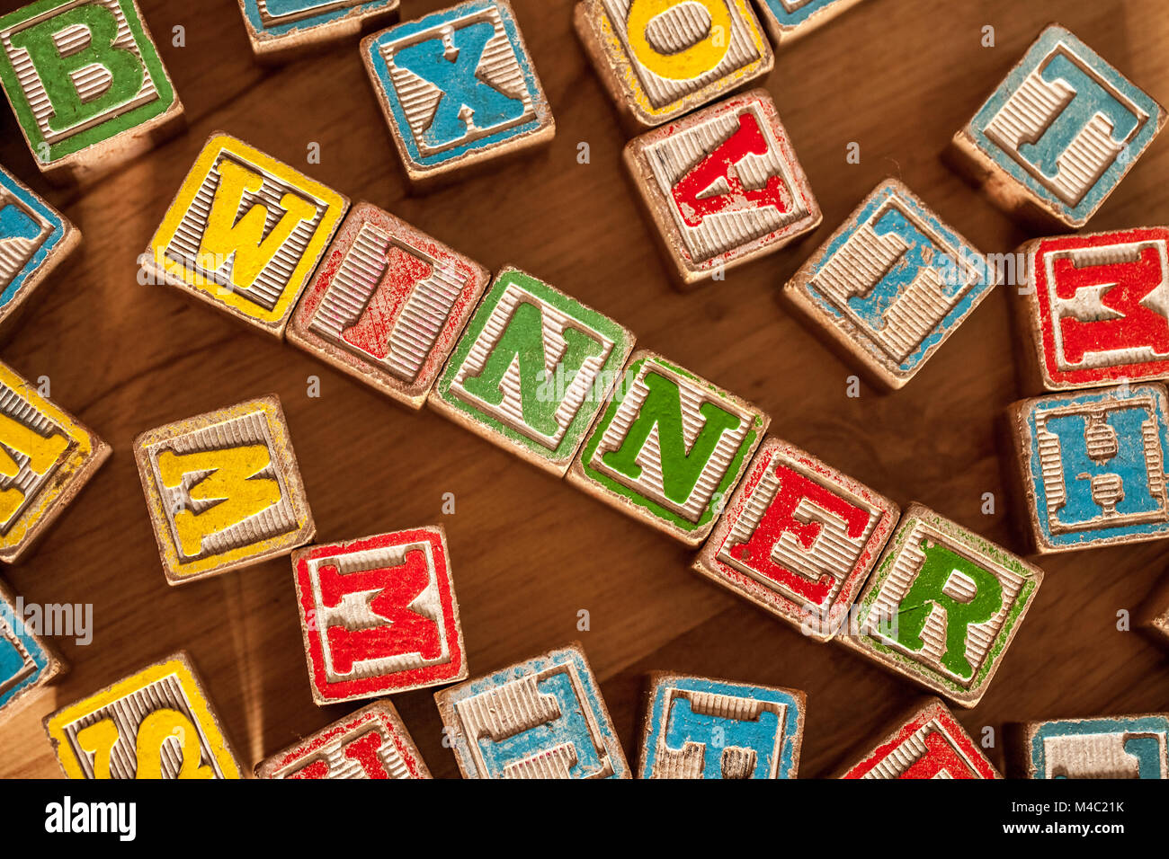 Wooden Toy Blocks Spell Winner Stock Photo - Alamy