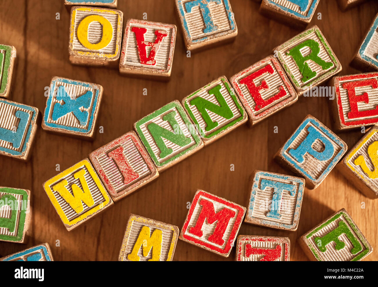 Wooden Toy Blocks Spell Winner Stock Photo - Alamy