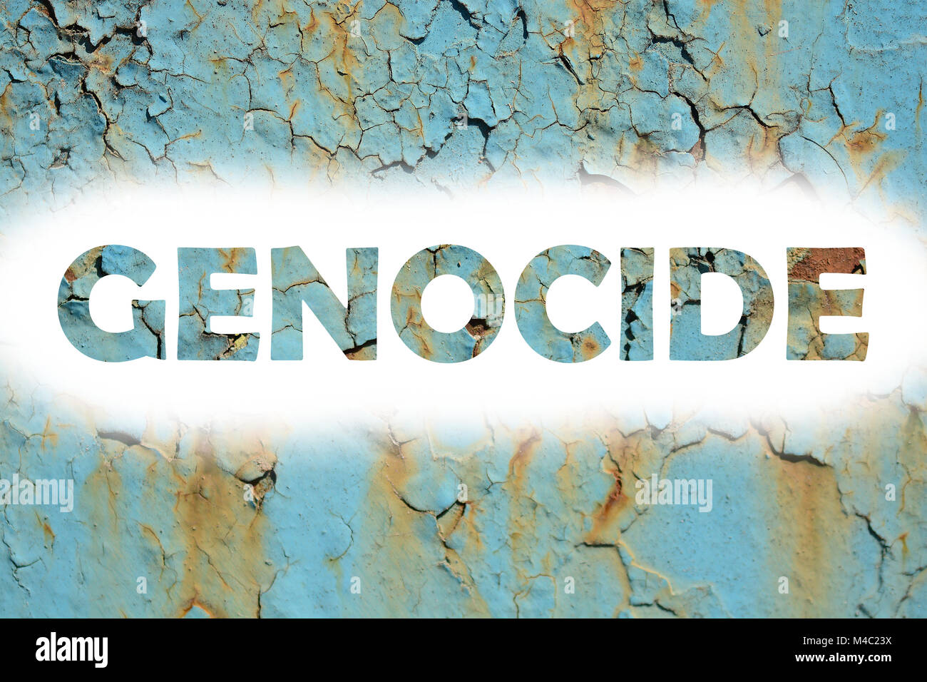 genocide words print on the grunge metallic wall Stock Photo - Alamy