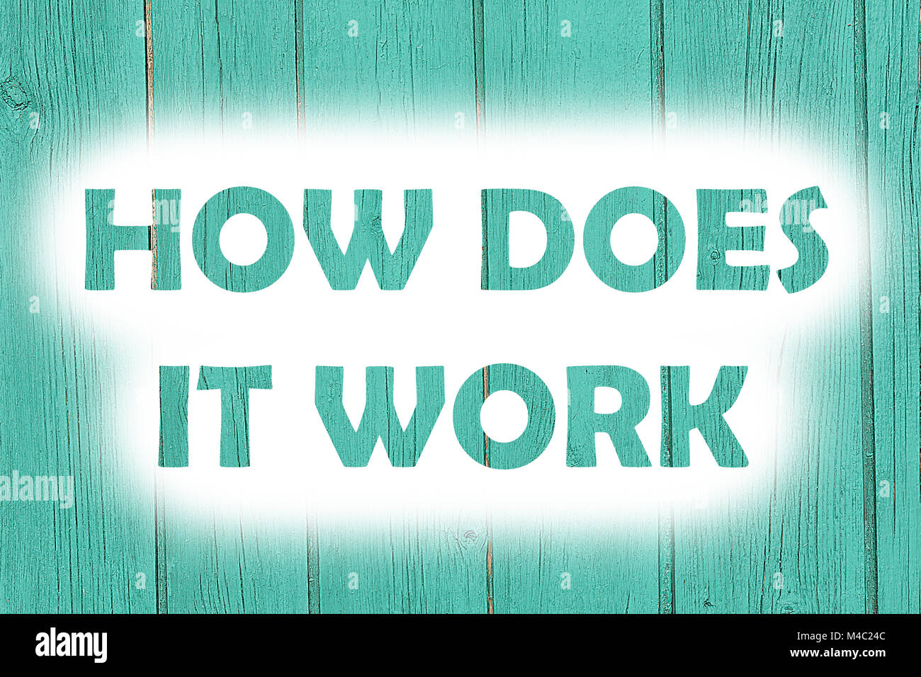 how does it work words print on the wooden plate Stock Photo - Alamy