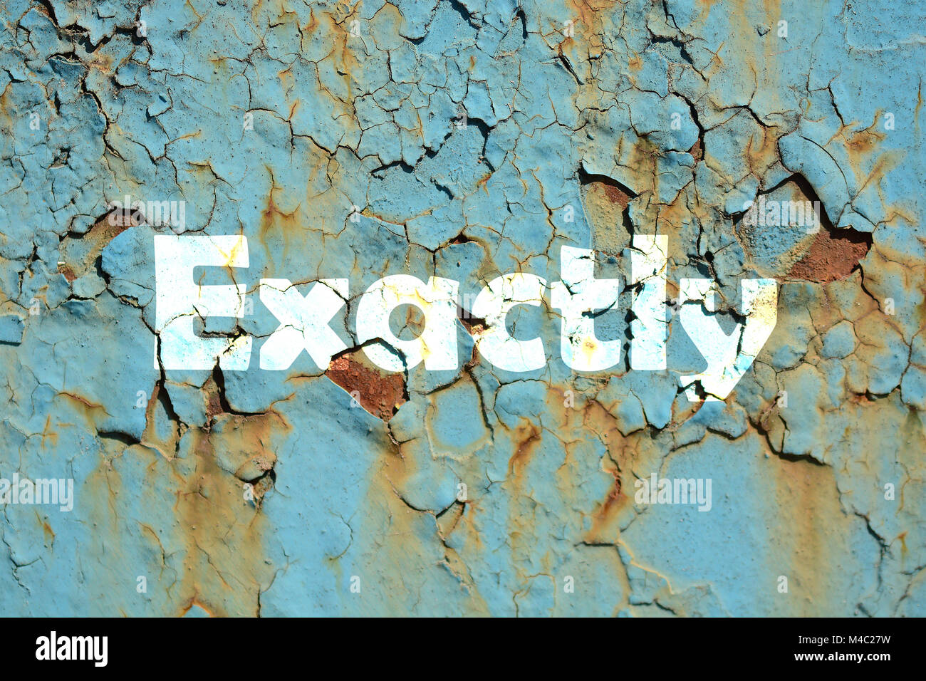 exactly word print on the rusted metal corrugated metal background ...