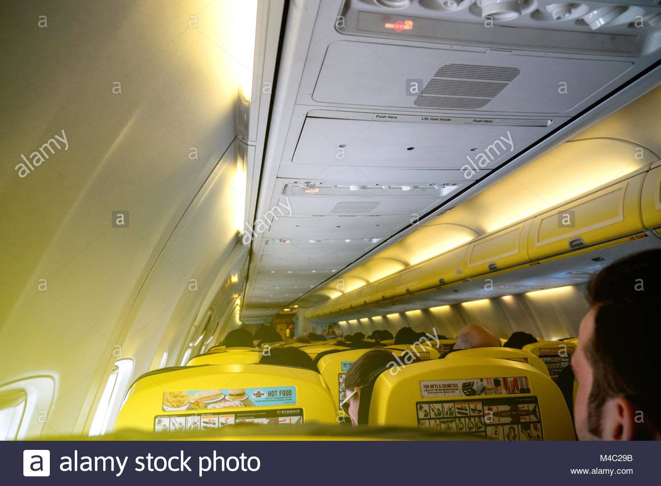 Ryanair Plane Cabin Interior Stock Photos & Ryanair Plane Cabin ...