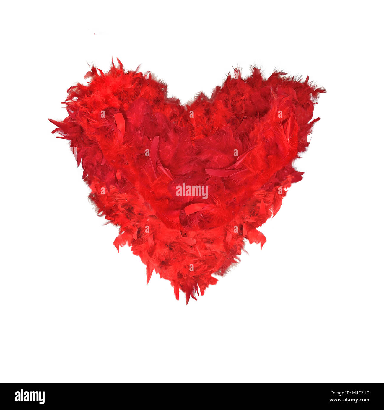 Red feathers heart shape Stock Photo - Alamy
