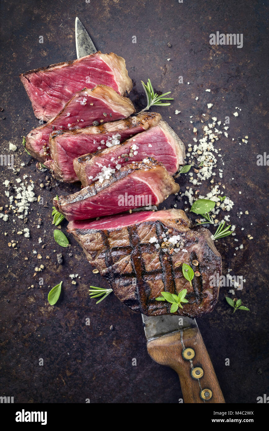 Barbecue Adged Roast Beef on old Metal Sheet Stock Photo - Alamy