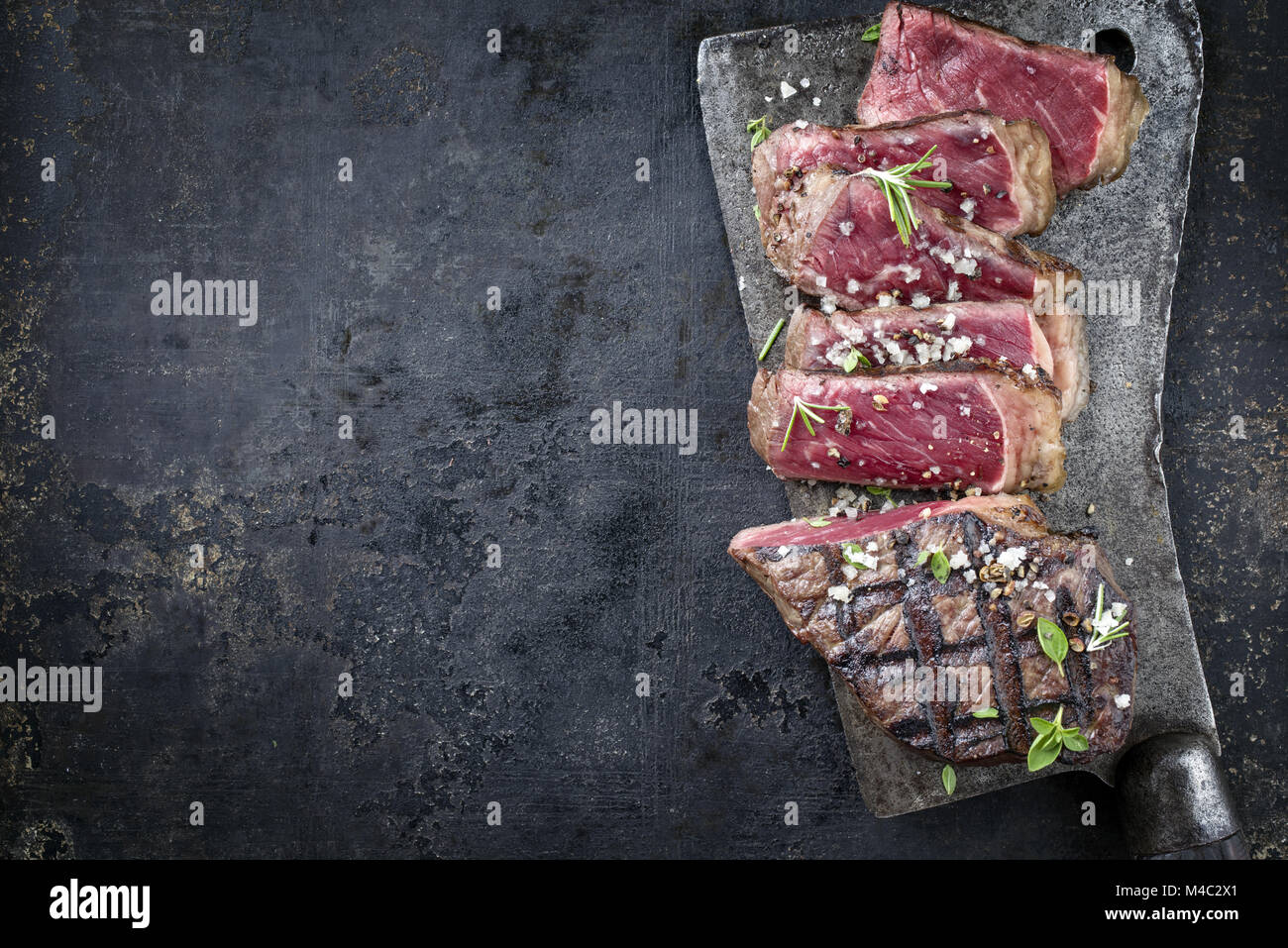 Barbecue Aged Roast Beef on old Metal Sheet Stock Photo - Alamy
