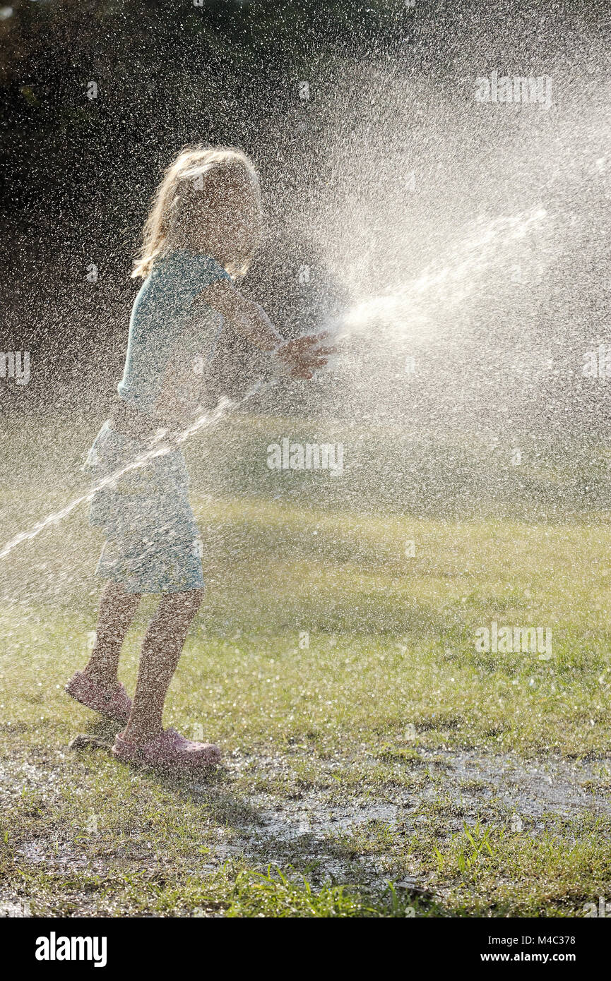 Play with water jets Stock Photo - Alamy