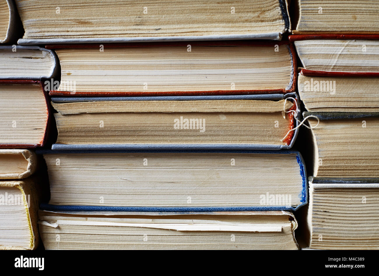 Stack of old worn books Stock Photo - Alamy