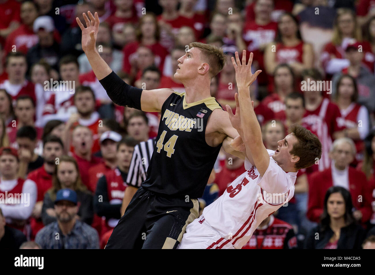 Madison, WI, USA. 15th Feb, 2018. Purdue Boilermakers center Isaac Haas #44 posts up on ...
