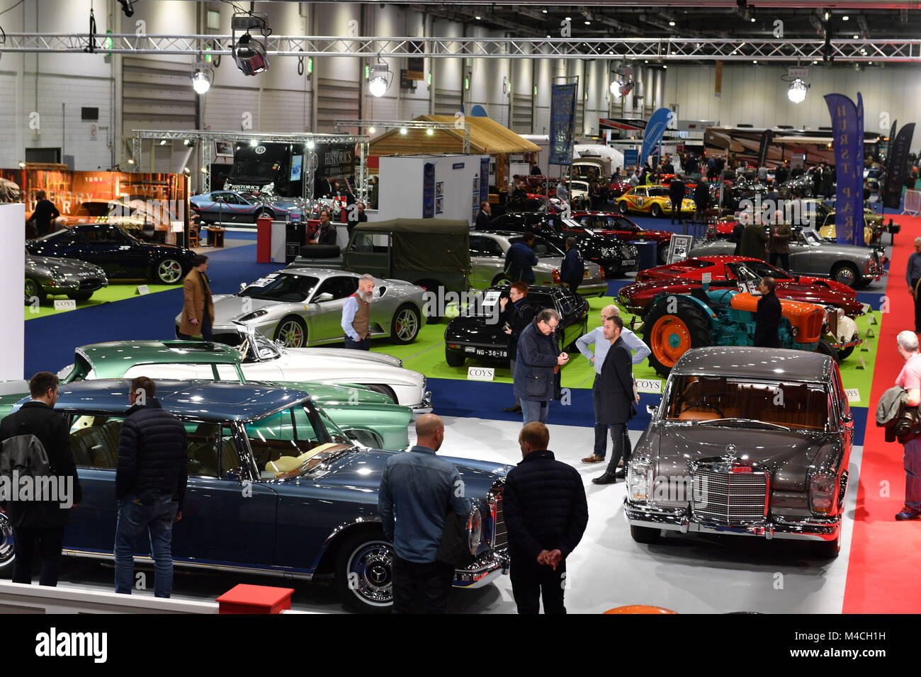 A collection of classic cars on display at the preview of the London ...