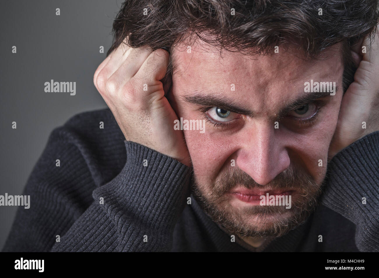 Deranged angry young man Stock Photo - Alamy