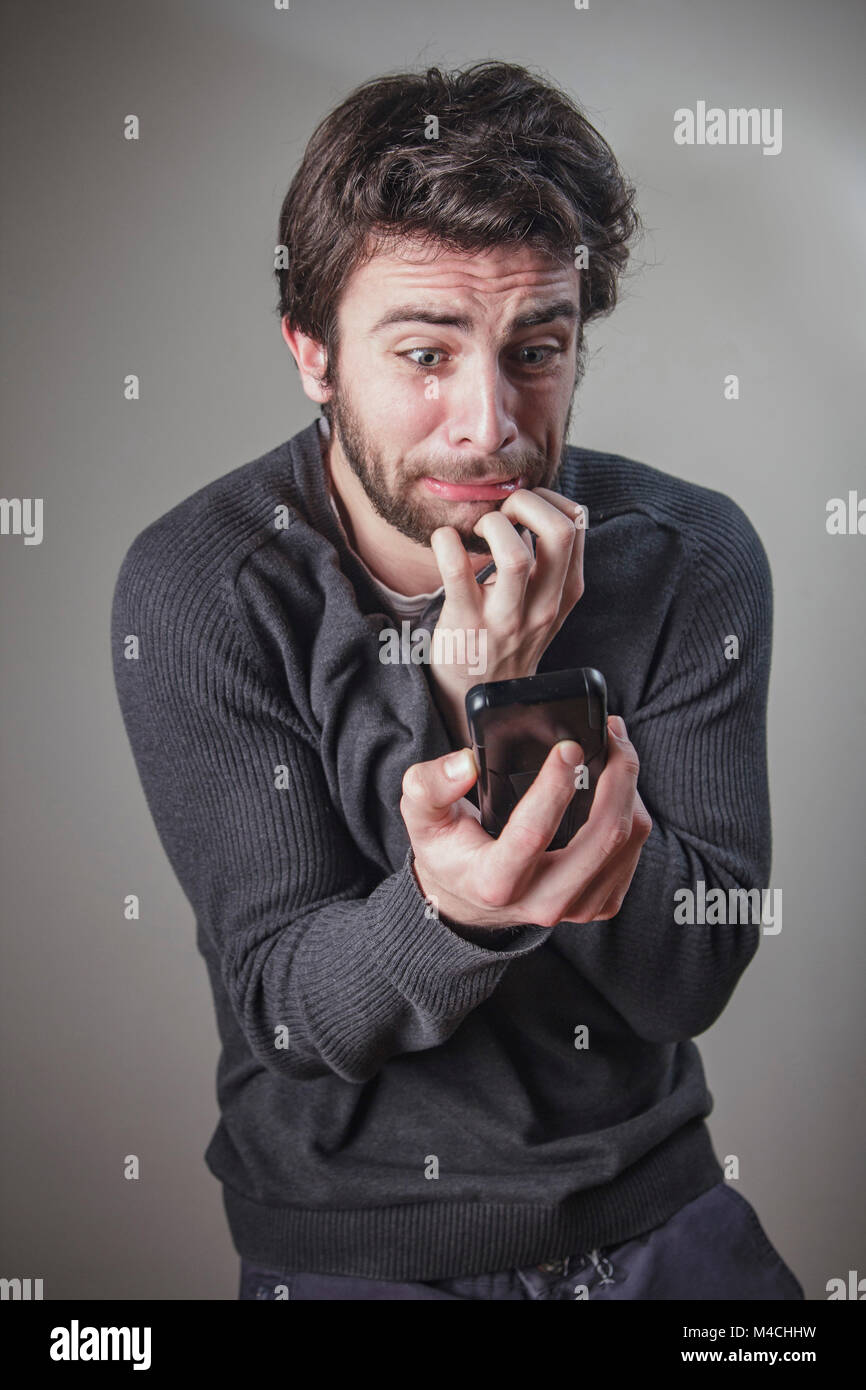 Shocking telephone news Stock Photo - Alamy