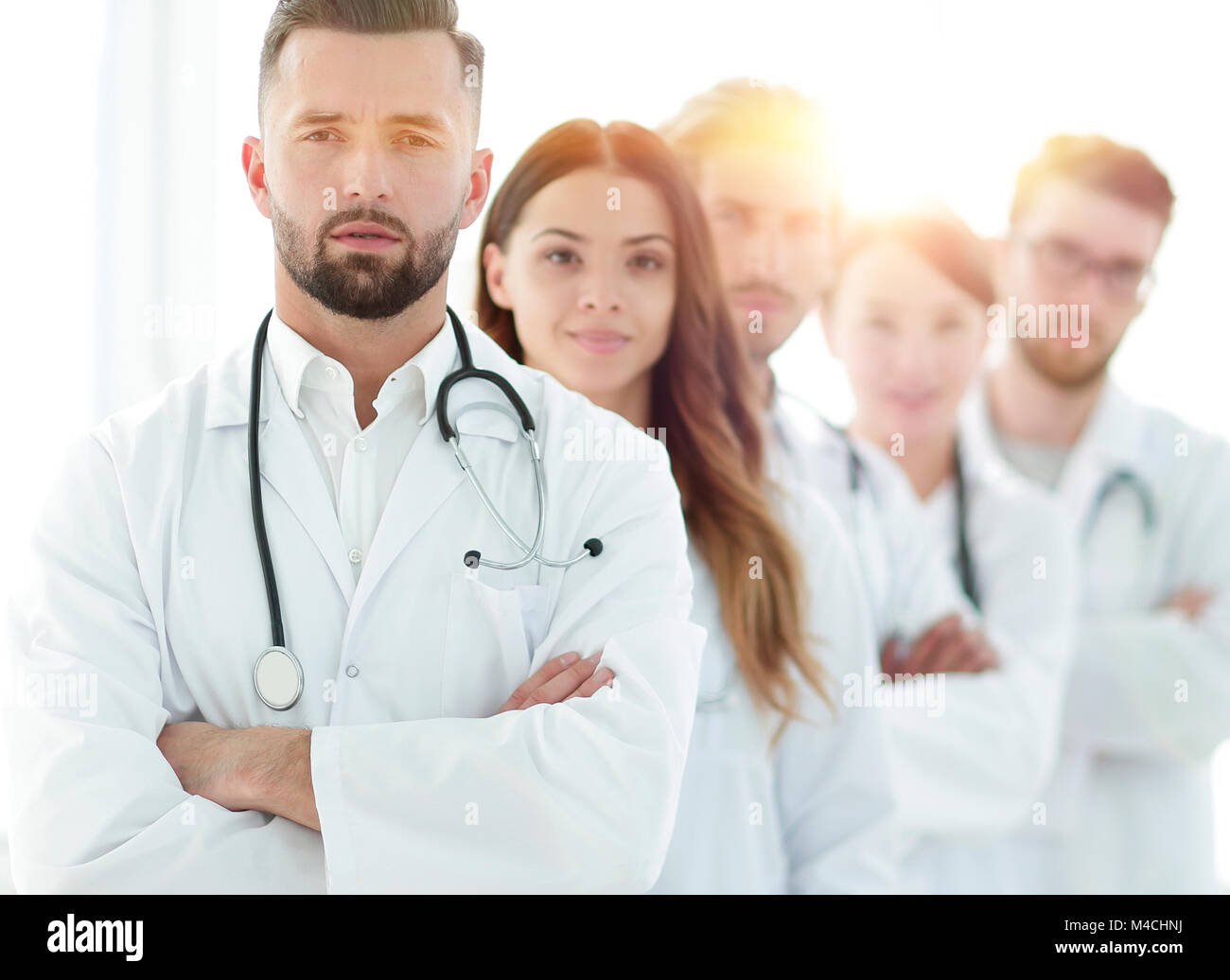 Portrait of medical team standing together Stock Photo - Alamy